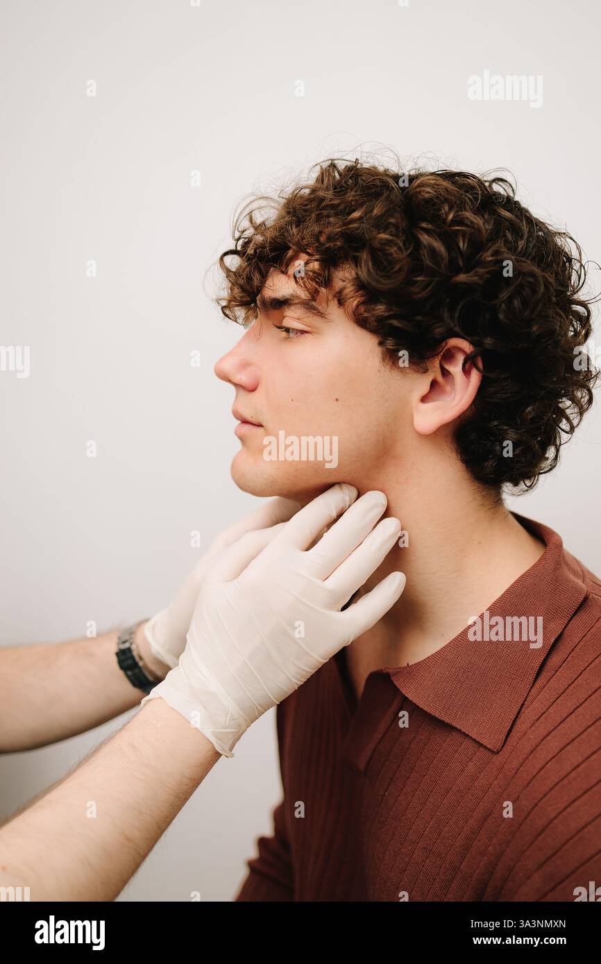 ENT doctor examined the submandibular lymph nodes of male patient. ENT ...