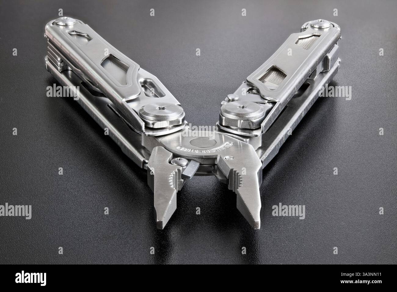 Pliers multi tool close up parts pivot point or fulcrum, pipe grip, tip ...