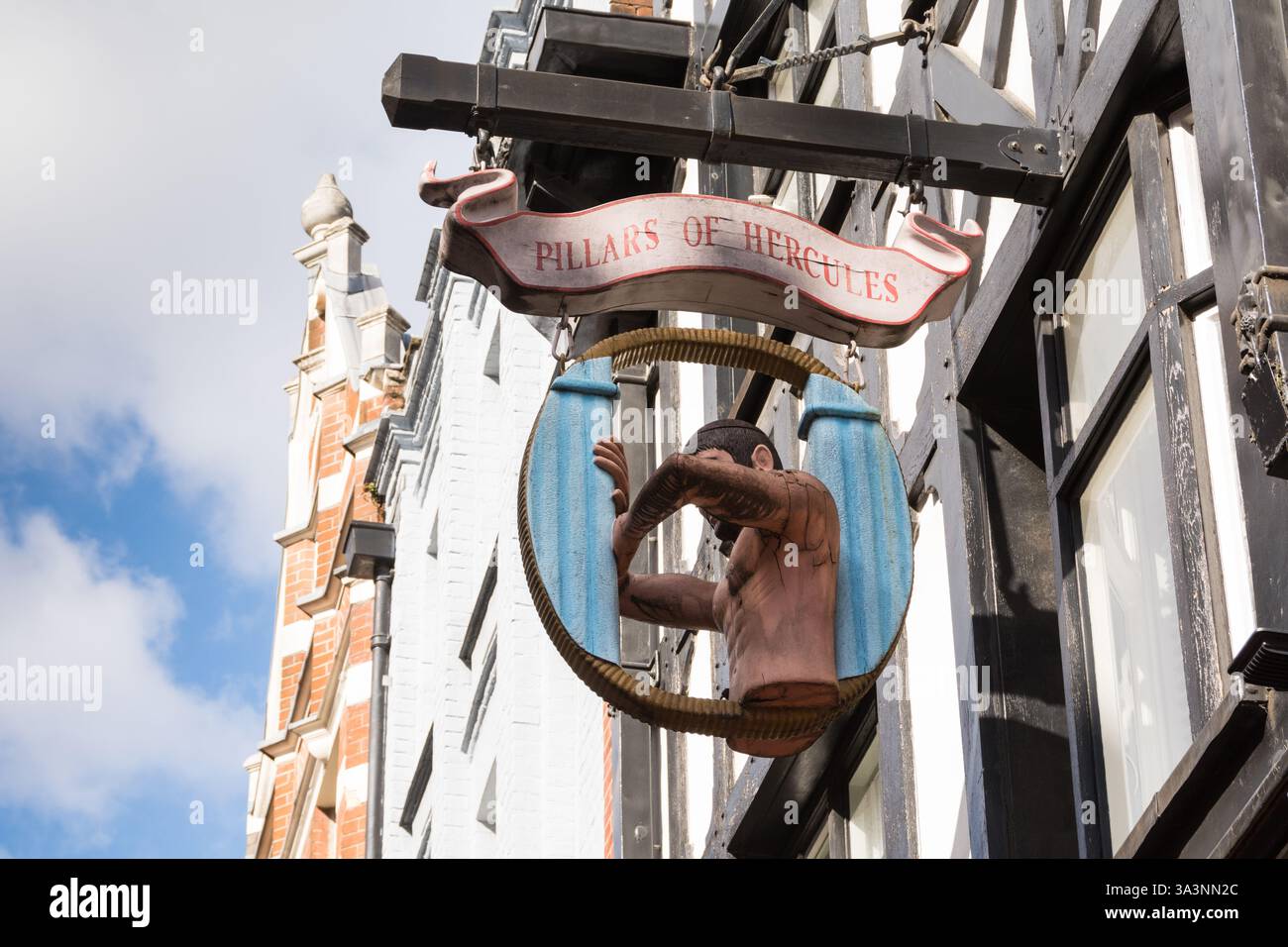 Pub sign outside the mock-Tudor frontage of the Pillars of Hercules ...