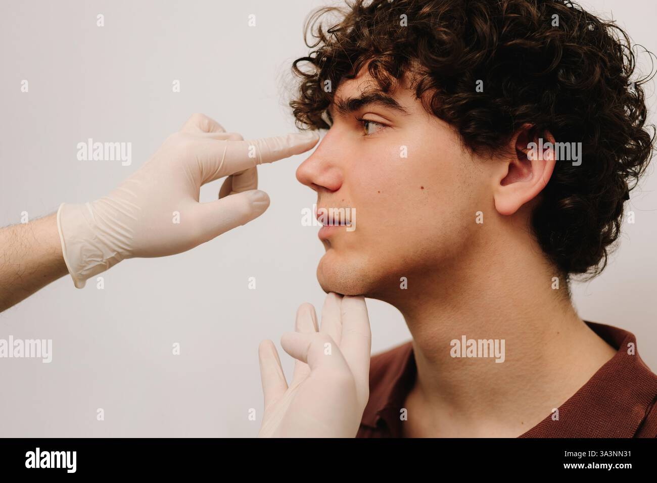 Rhinoplasty consultation for man before plastic surgery to correct the ...