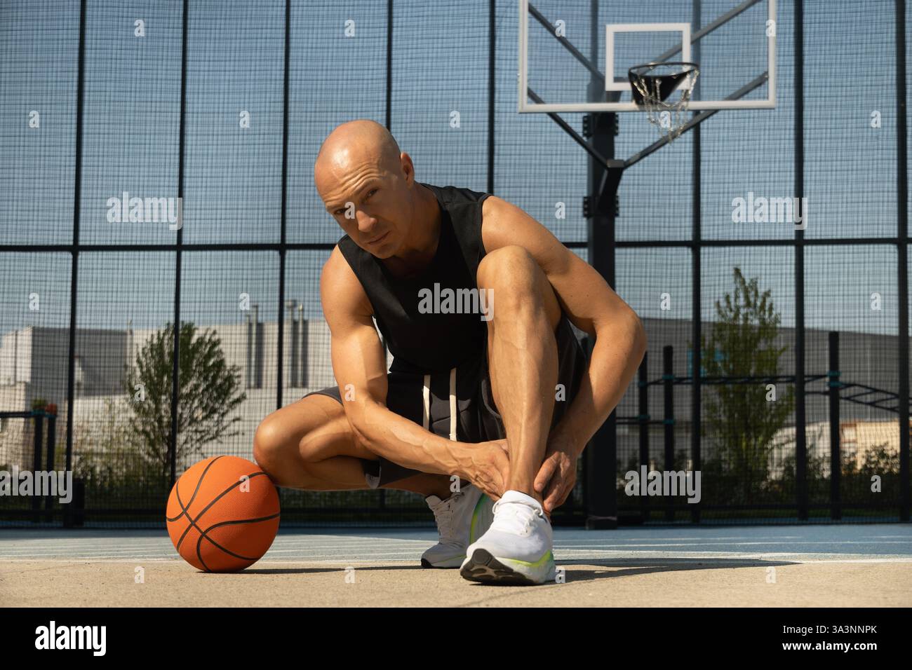 Basketball ankle injury or pain. Basketball player check legs after ...