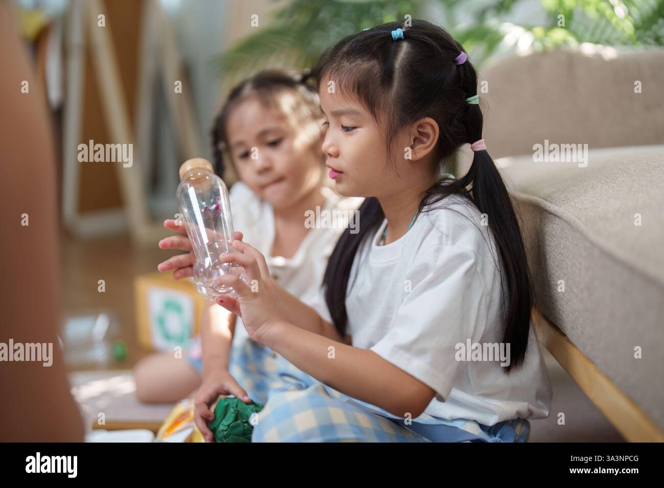 Recycling and Creativity. Children engaging in recycling to create new ...