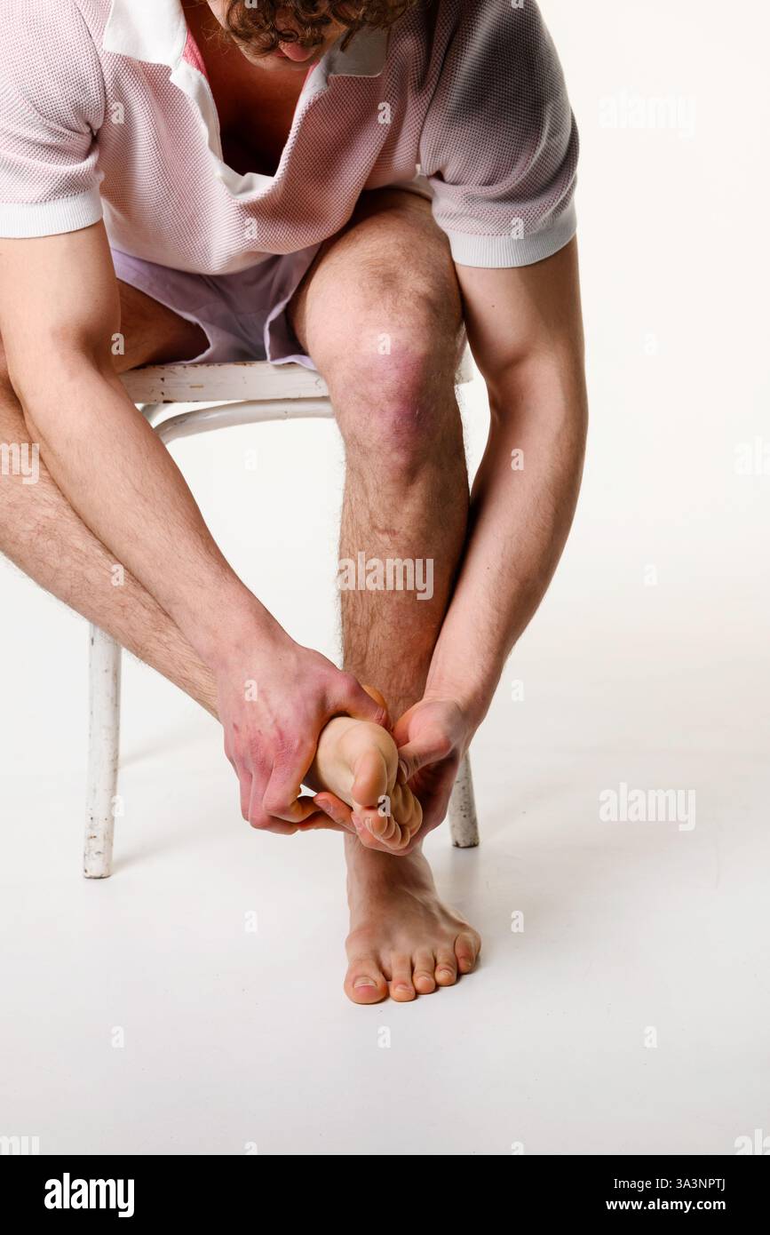 Podological problems. Experiencing sharp pain from flattened arches of ...