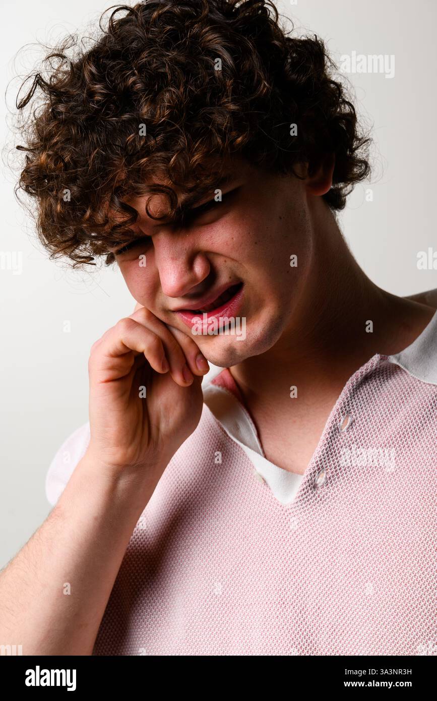 Man is struggling from pulpitis. Cracked tooth hurts from bacterial ...