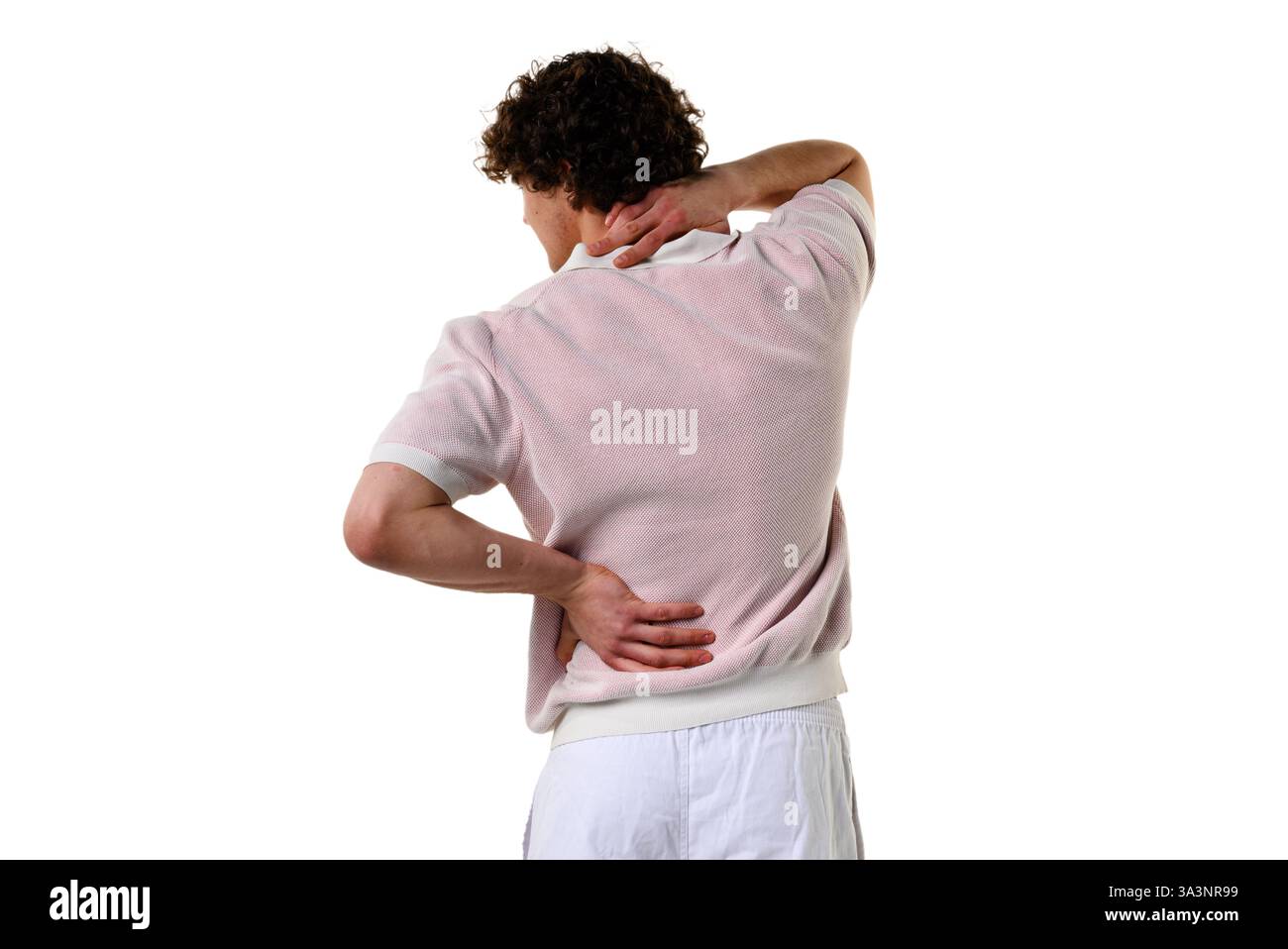 Struggling with chronic painful backache. Young man in suffering from ...