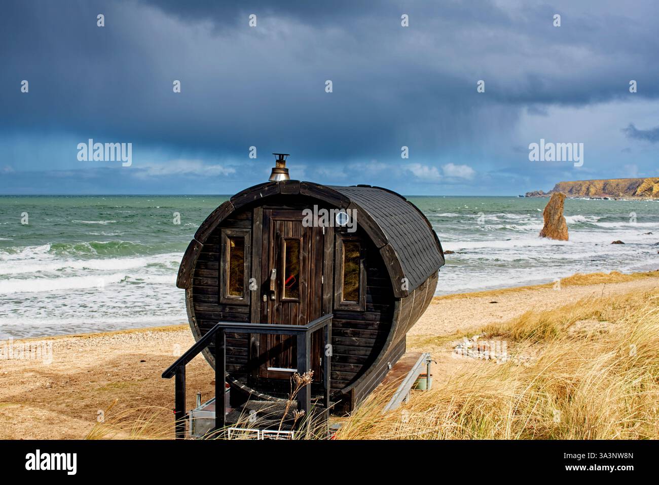 Cullen Bay Moray Scotland sunshine rain clouds and a barrel shaped ...