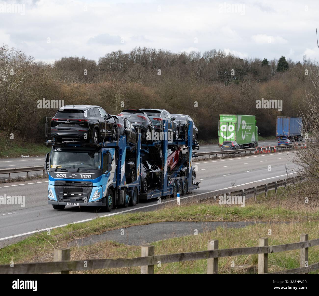 ECM transporter carrying new Volkswagen cars on the M40 motorway ...