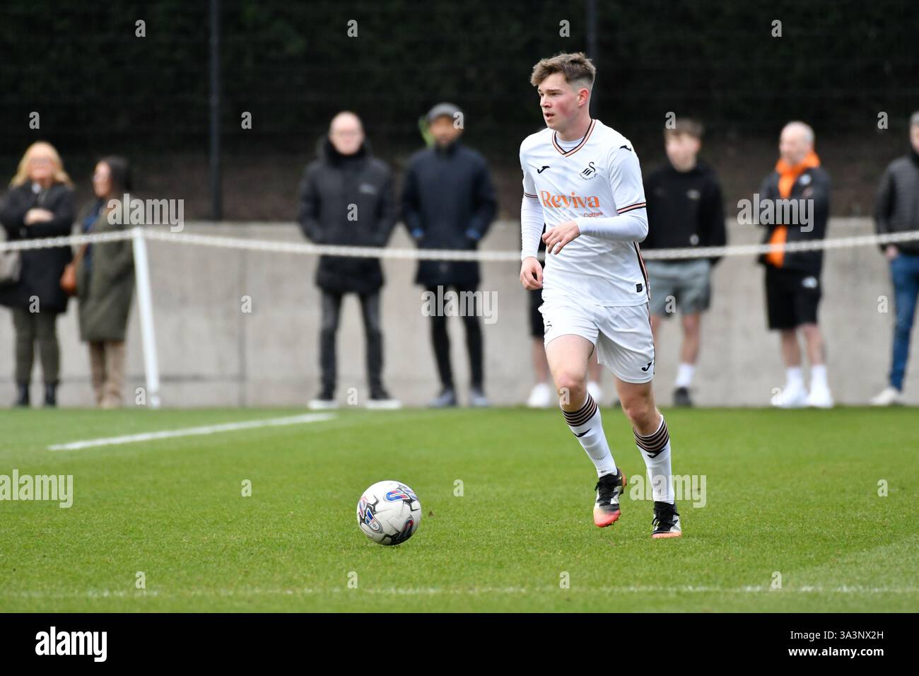 Landore, Swansea, Wales. 15 March 2025. Elis Thomas of Swansea City in ...