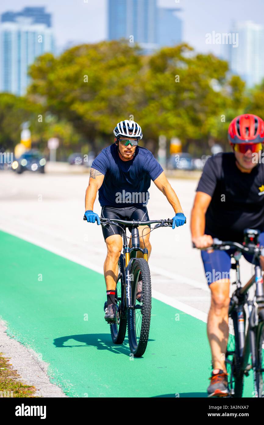 Miami group bike ride Key Biscayne Florida Stock Photo - Alamy