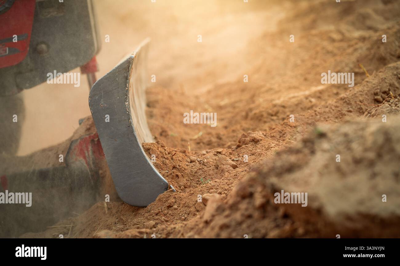 Construction tractor with specialized dozer blade pushing and grading ...