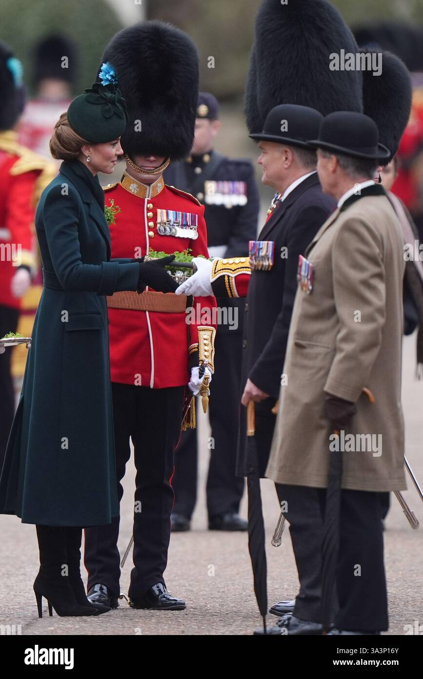 The Princess of Wales presents the traditional sprigs of shamrock to ...
