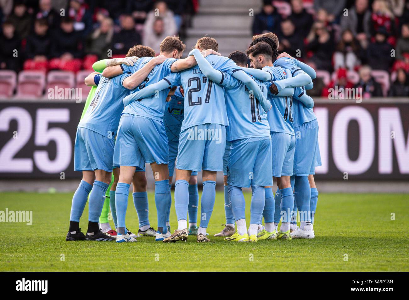 Herning, Denmark. 16th, March 2025. The players of Randers FC unite in ...