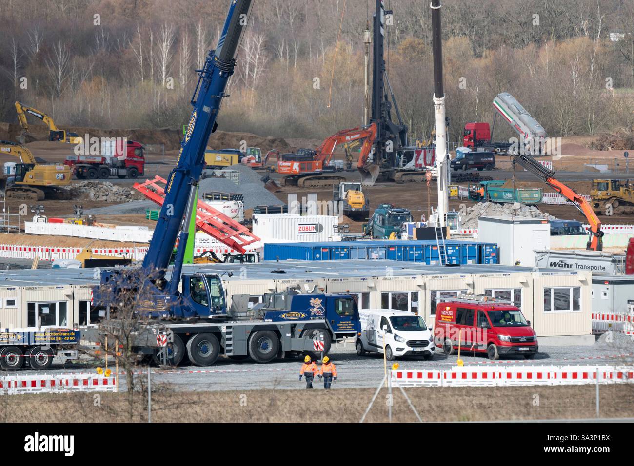 Dresden, Germany. 17th Mar, 2025. Construction vehicles are parked on ...