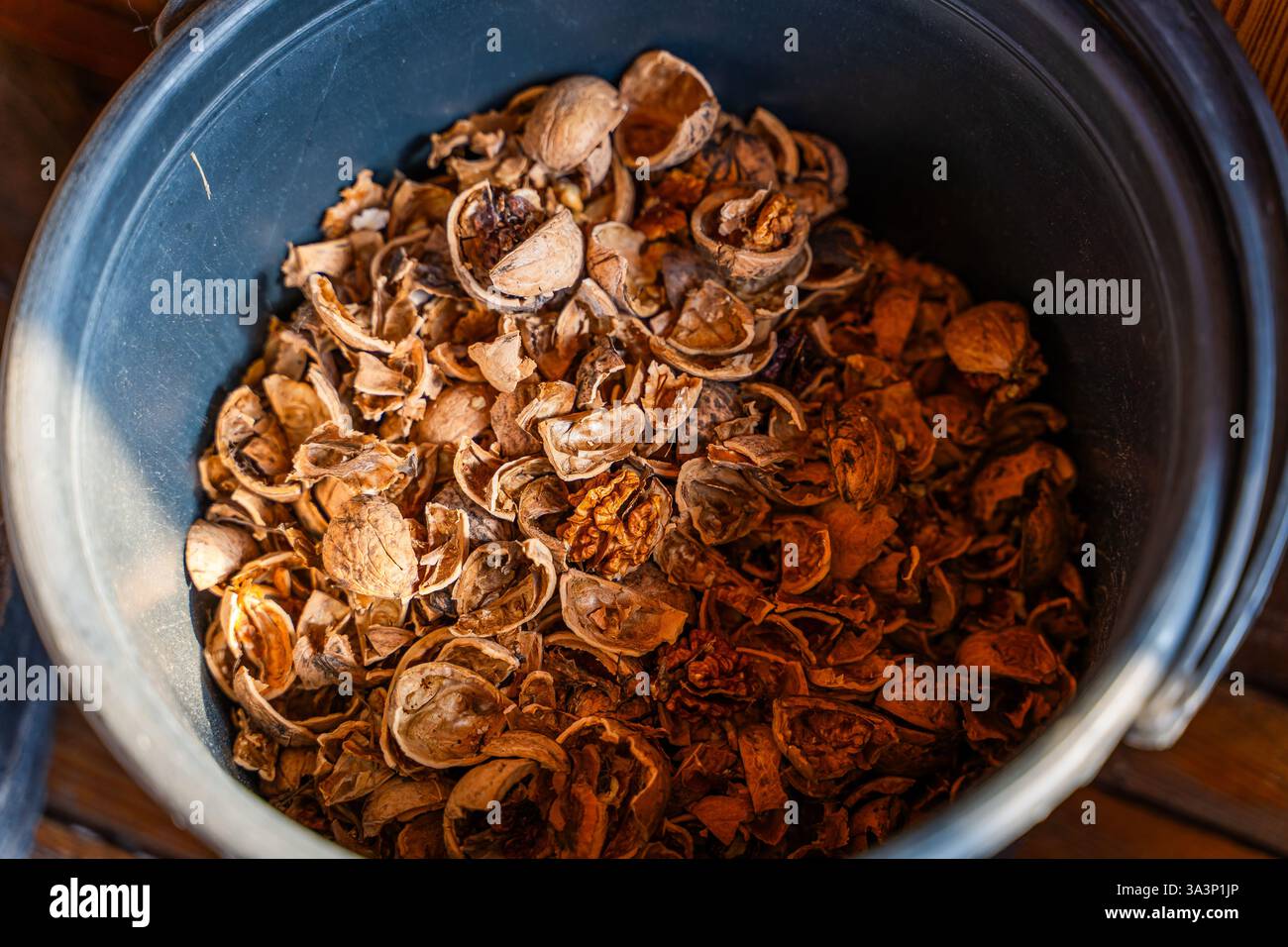 Walnut shells in bucket hi-res stock photography and images - Alamy