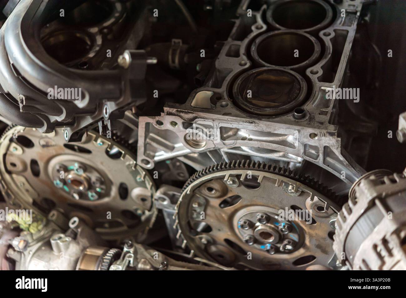 Disassembled car dirty engine close-up to engine parts and pulley at ...