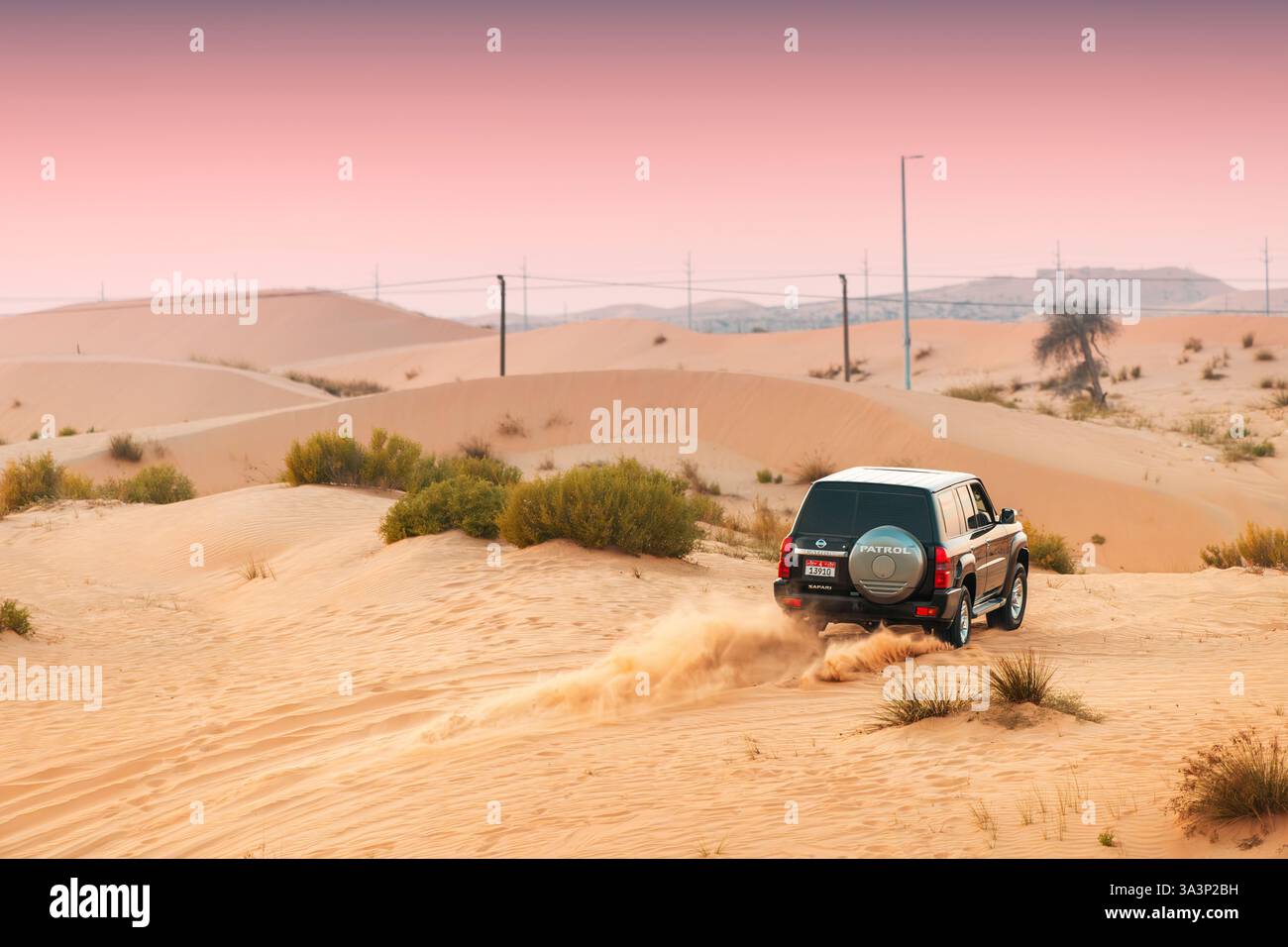 20 January 2025, Abu Dhabi, UAE: Off road vehicle navigating through ...
