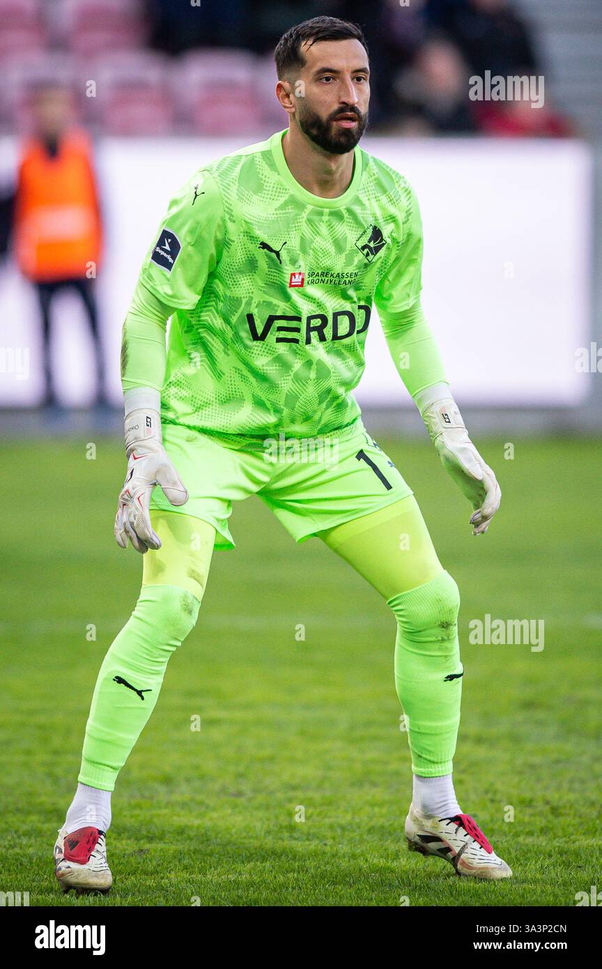 Herning, Denmark. 16th Mar, 2025. Goalkeeper Paul Izzo (1) of Randers ...