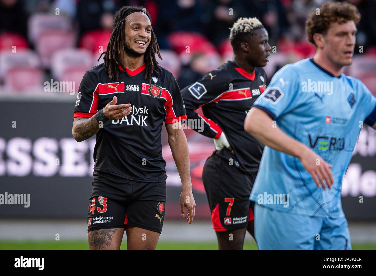 Herning, Denmark. 16th Mar, 2025. Kevin Mbabu (43) of FC Midtjylland ...