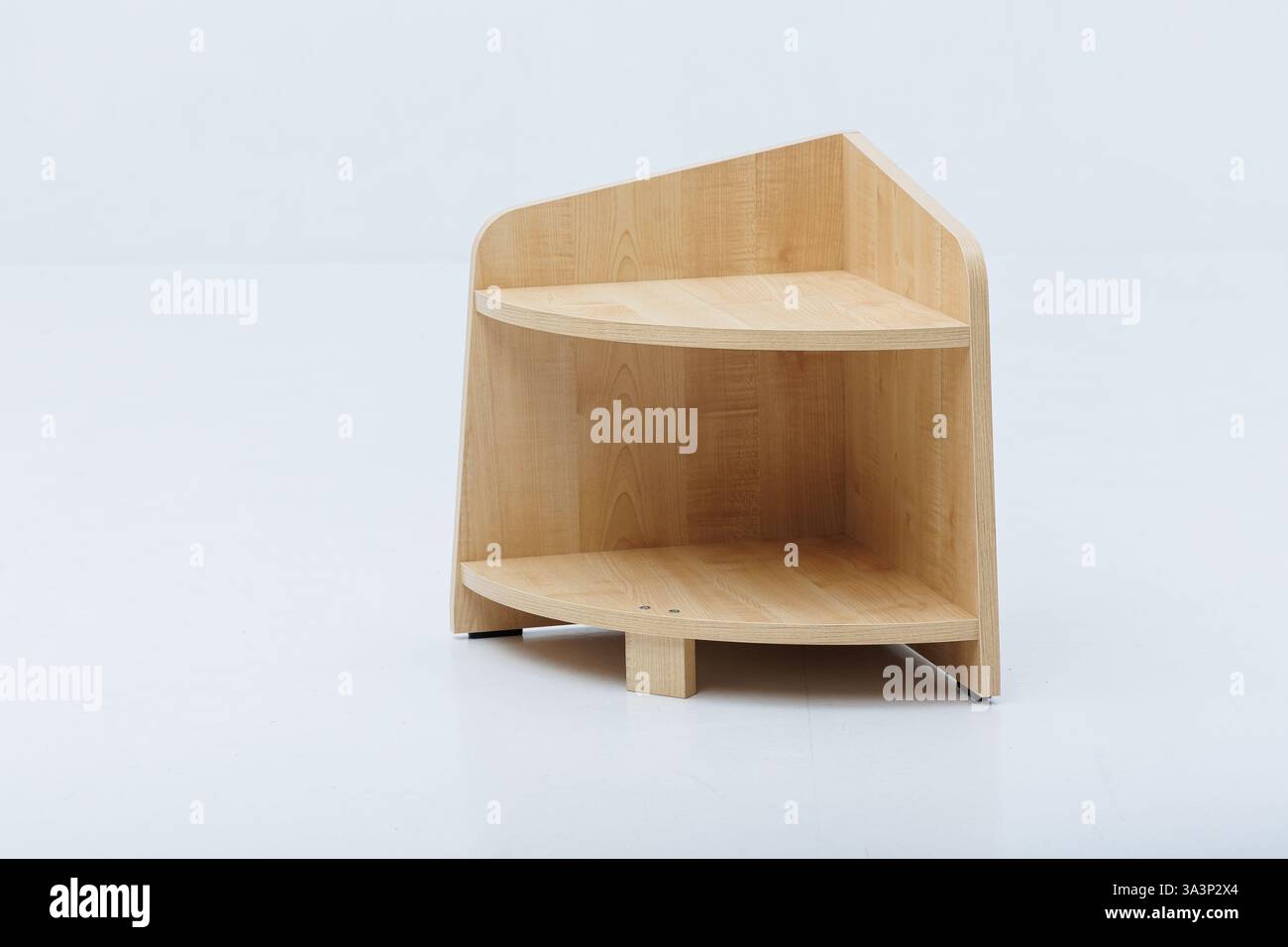 A small wooden shelf that features two separate shelves sitting ...