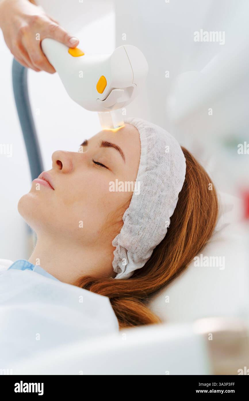 IPL face pigmentation therapy by beautician. Ultrasound laser facial ...