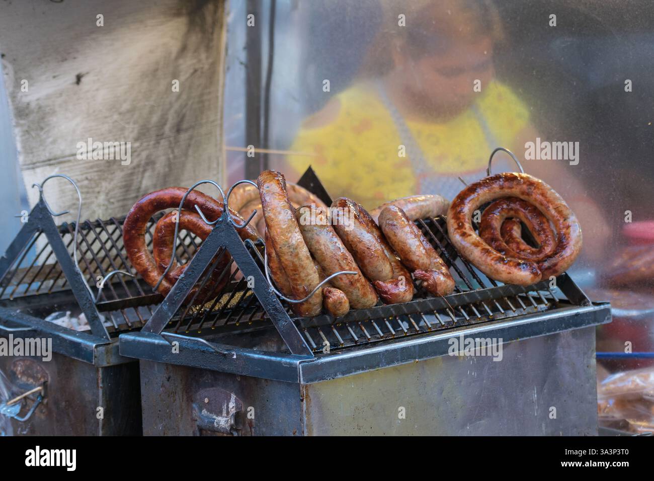 Thai exotic food in street food market with grilled sausages. Like the ...