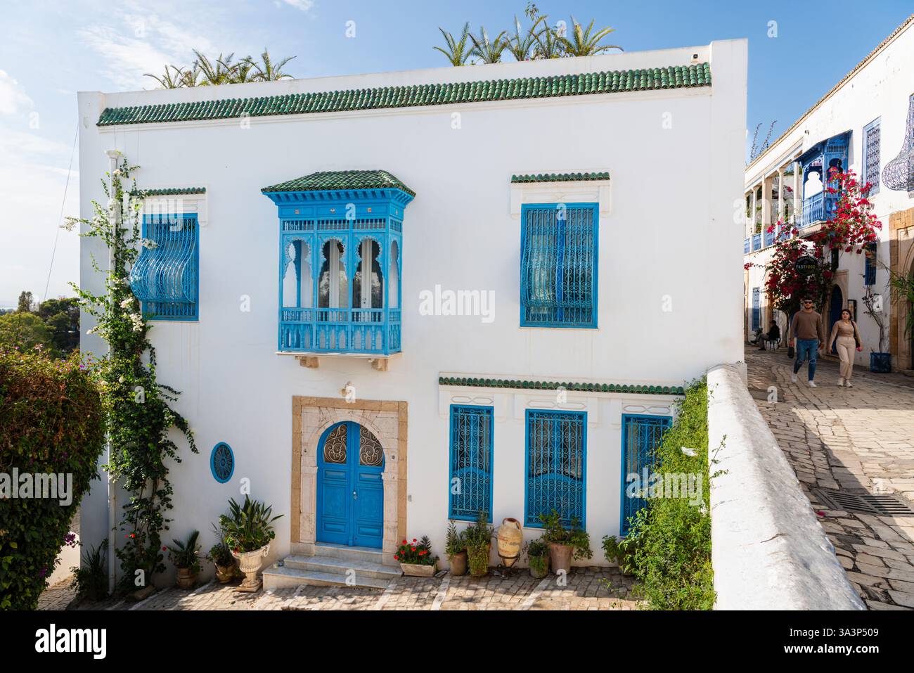 One of the typical blue and white houses at the UNESCO World Heritage ...