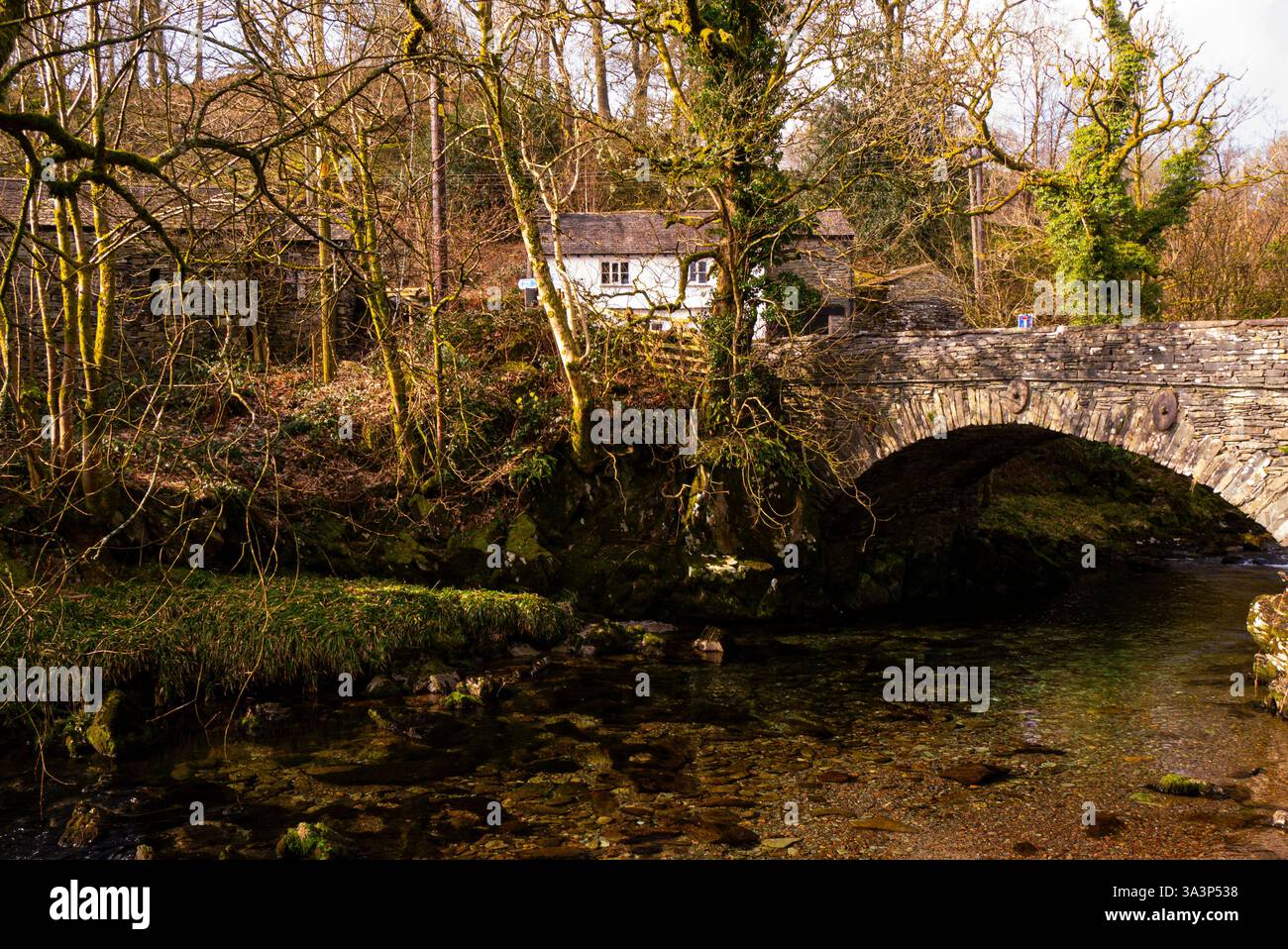 Old stone road bridge over river brathay hi-res stock photography and ...