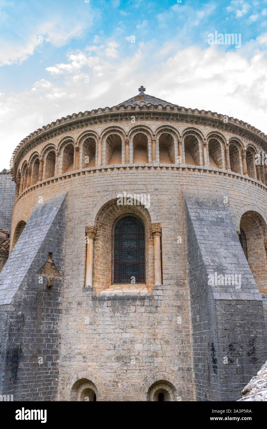 Ancient Romanesque church with arched windows and stone walls ...