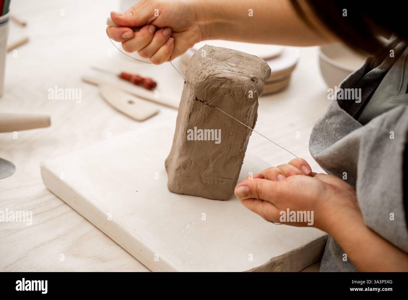 Cutting off necessary piece hi-res stock photography and images - Alamy