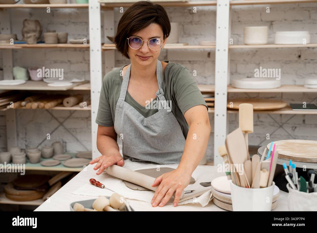 Preparing clay cutting assembling hi-res stock photography and images ...