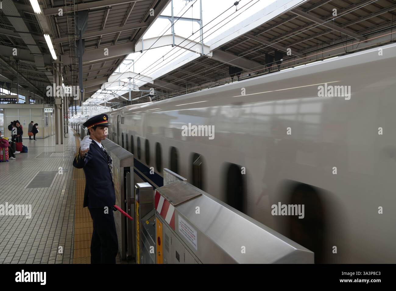 Bullet train and conductor in uniform, Kyoto station, Japan, Asia Stock Photo - Alamy
