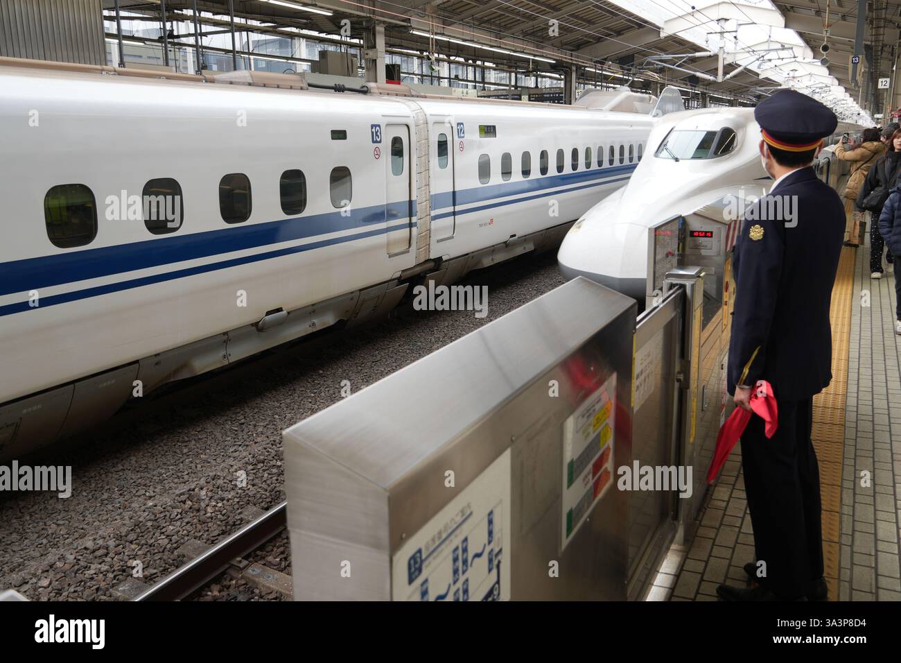 Bullet train and conductor in uniform, Kyoto station, Japan, Asia Stock ...