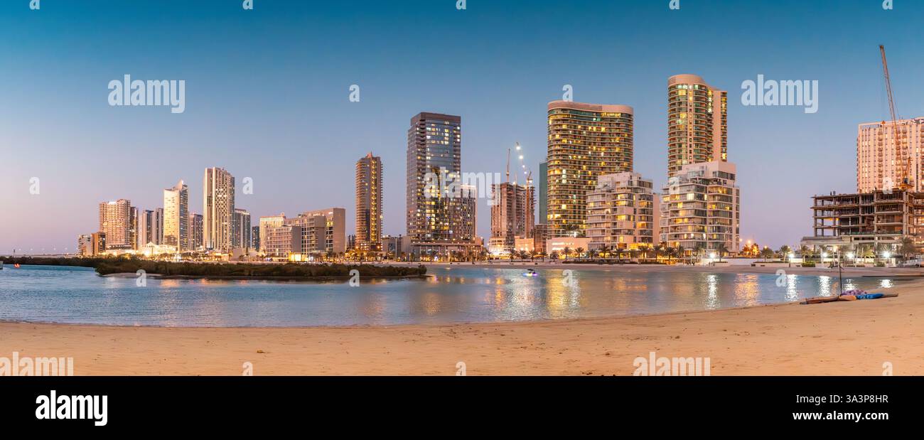 21 January 2025, Abu Dhabi, UAE: Modern skyscrapers reflecting on the ...