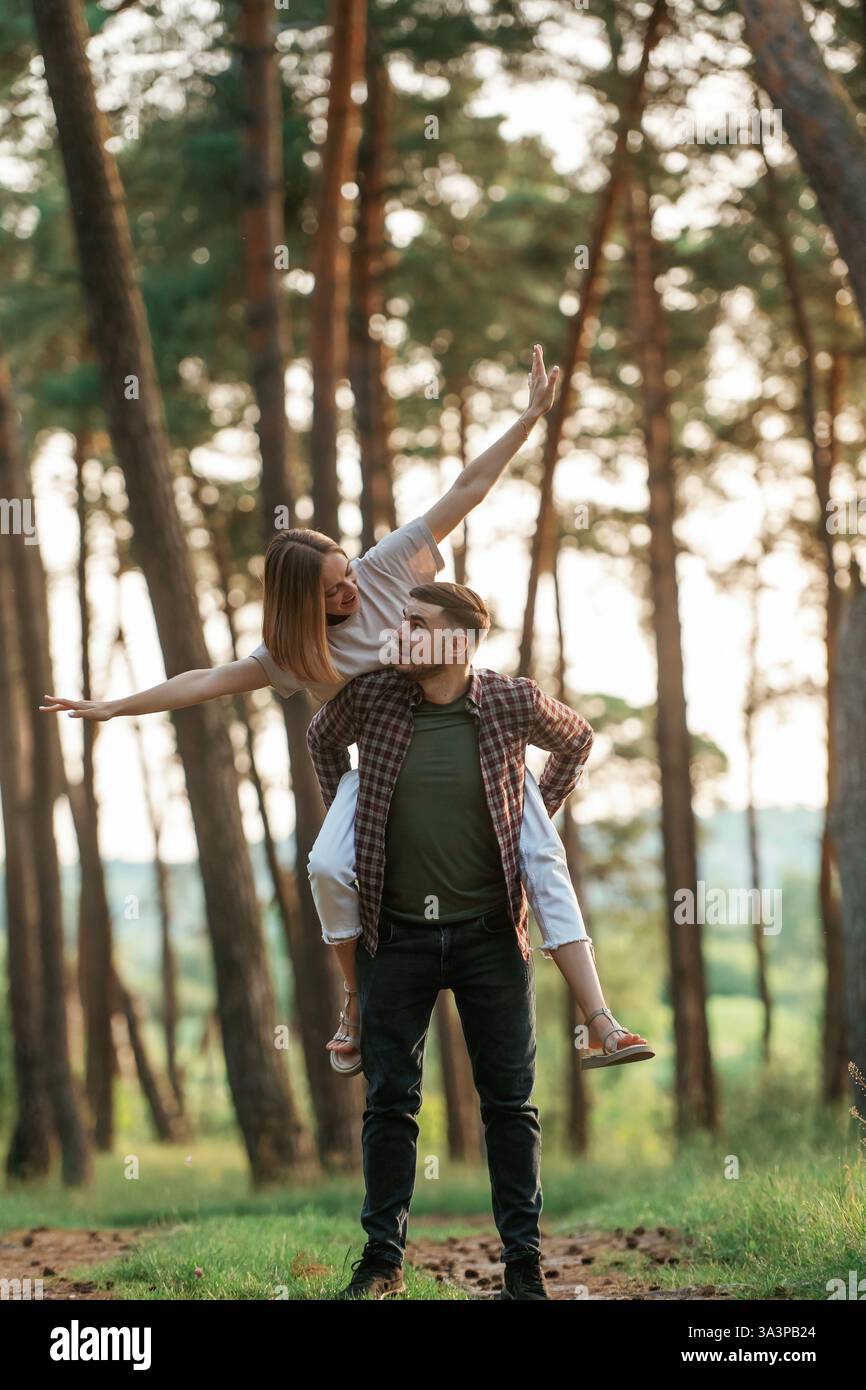 On The Back Of A Woman Riding Man
