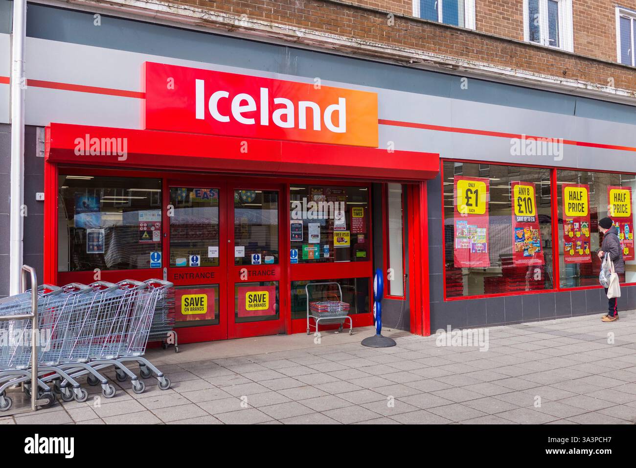 Iceland store in town centre ,Billingham,England,UK.Lady looking at ...