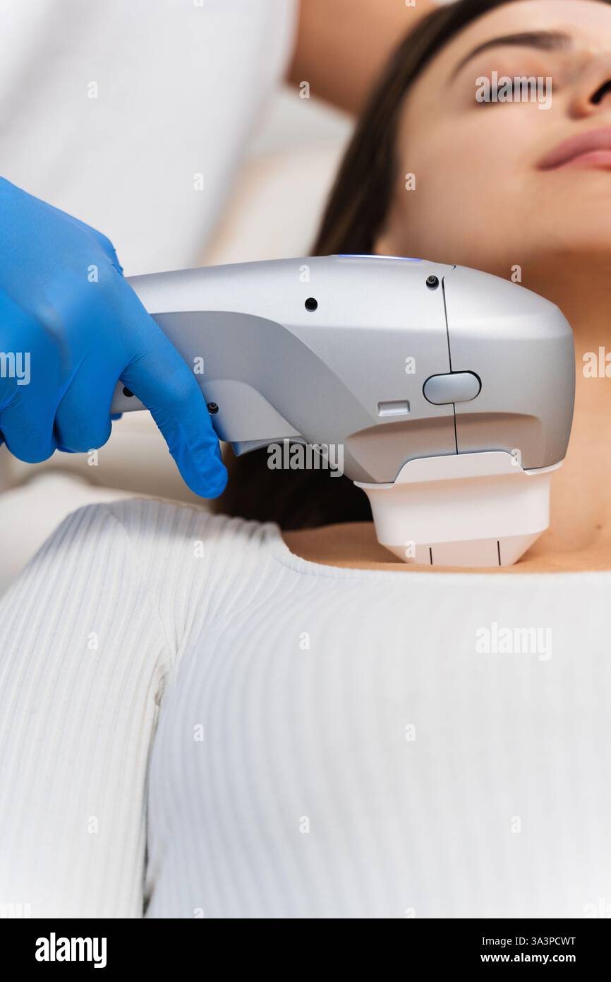 Ultraformer nonsurgical facelift process. Caucasian girl is having ...