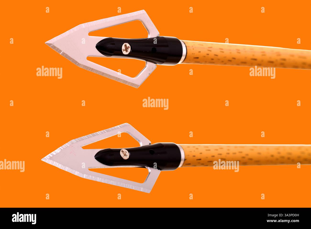 Hunting Arrow point on shaft isolated over an orange background Stock ...
