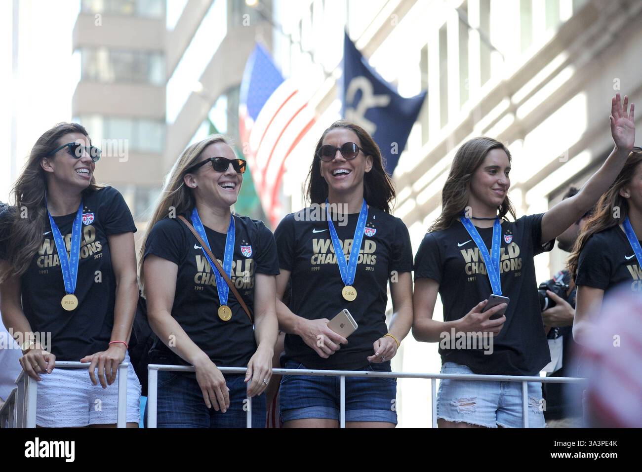 Soccer players aboard a float in the New York City Ticker Tape Parade ...