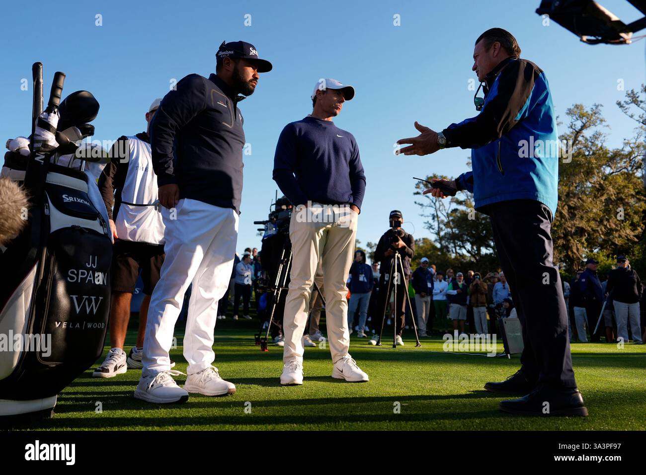 J.J. Spaun, left, and Rory McIlroy, of Northern Ireland, arrive for a ...