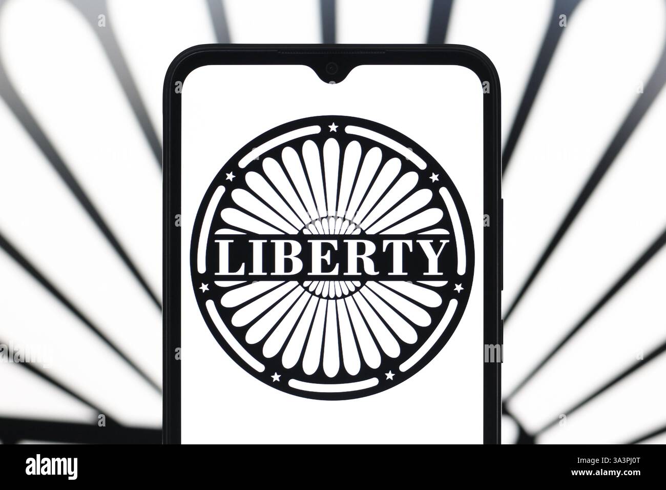 In this photo illustration, the Liberty Media logo is seen displayed on ...