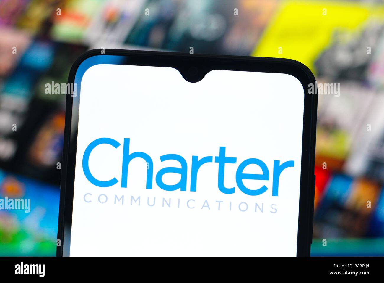 In this photo illustration, the Charter Communications logo is seen ...