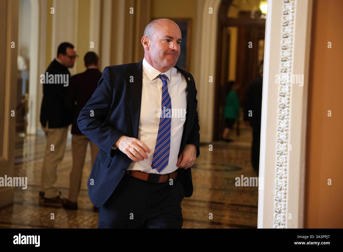 Sen. Mike Lee (R-Utah) is seen at the U.S. Capitol March 14, 2025 ...