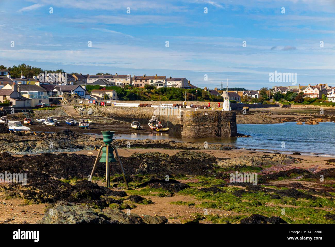 St Patrick's Bell or The Time and Tide Bell on the beach at Cemaes in ...