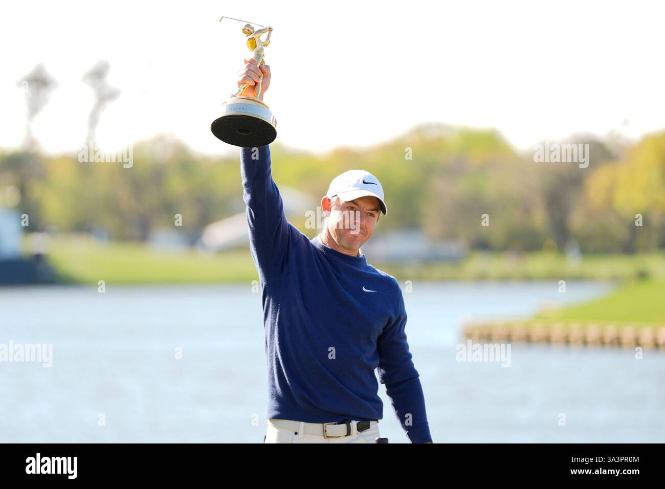 Rory McIlroy, of Northern Ireland, reacts during a trophy ceremony ...