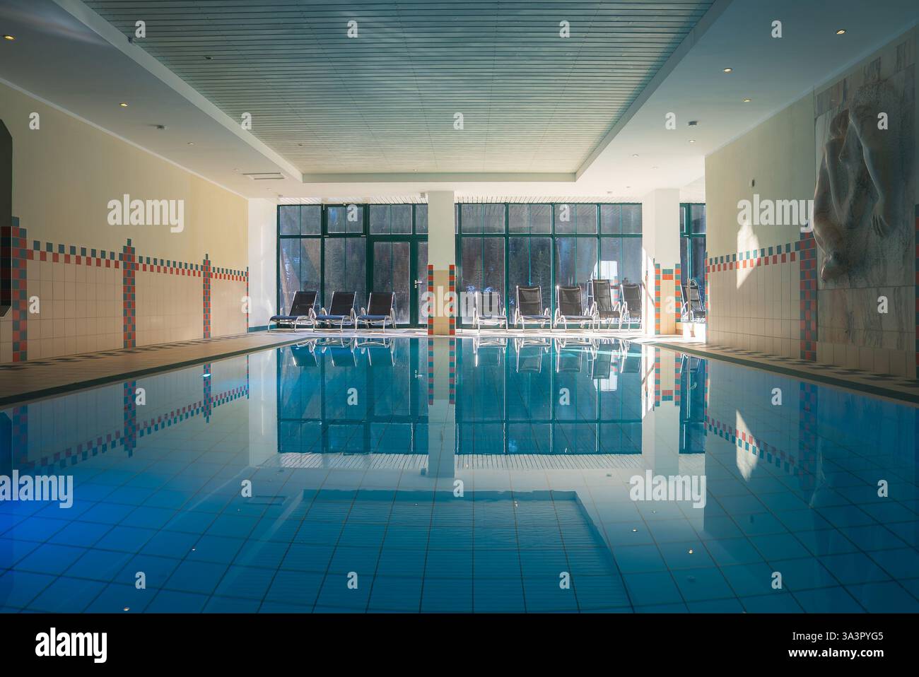 Indoor Luxury Pool with Checkered Walls and Glass Wall View Stock Photo ...