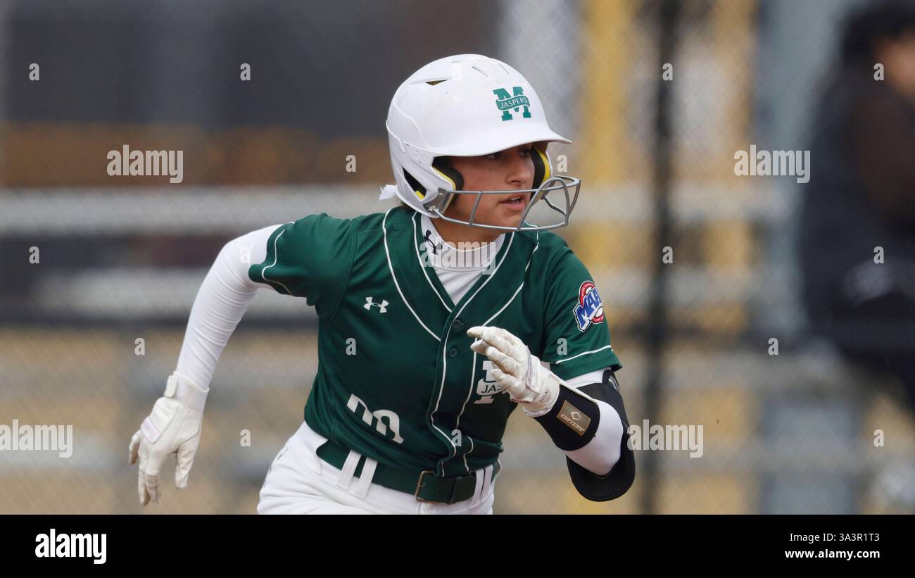 Manhattan utility Angelina Gencarelli (00) during an NCAA softball game ...
