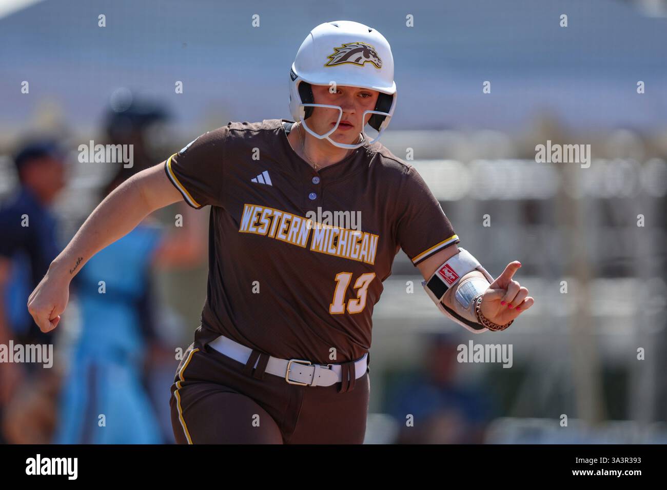 Western Michigan pitcher Jadeyn Merrill (13) runs to first during an ...