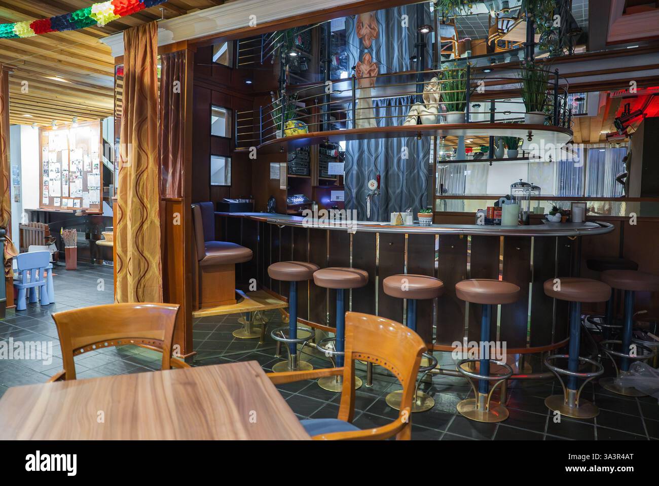 Modern Luxury Hotel Bar with Curved Counter and Mezzanine Level Stock ...