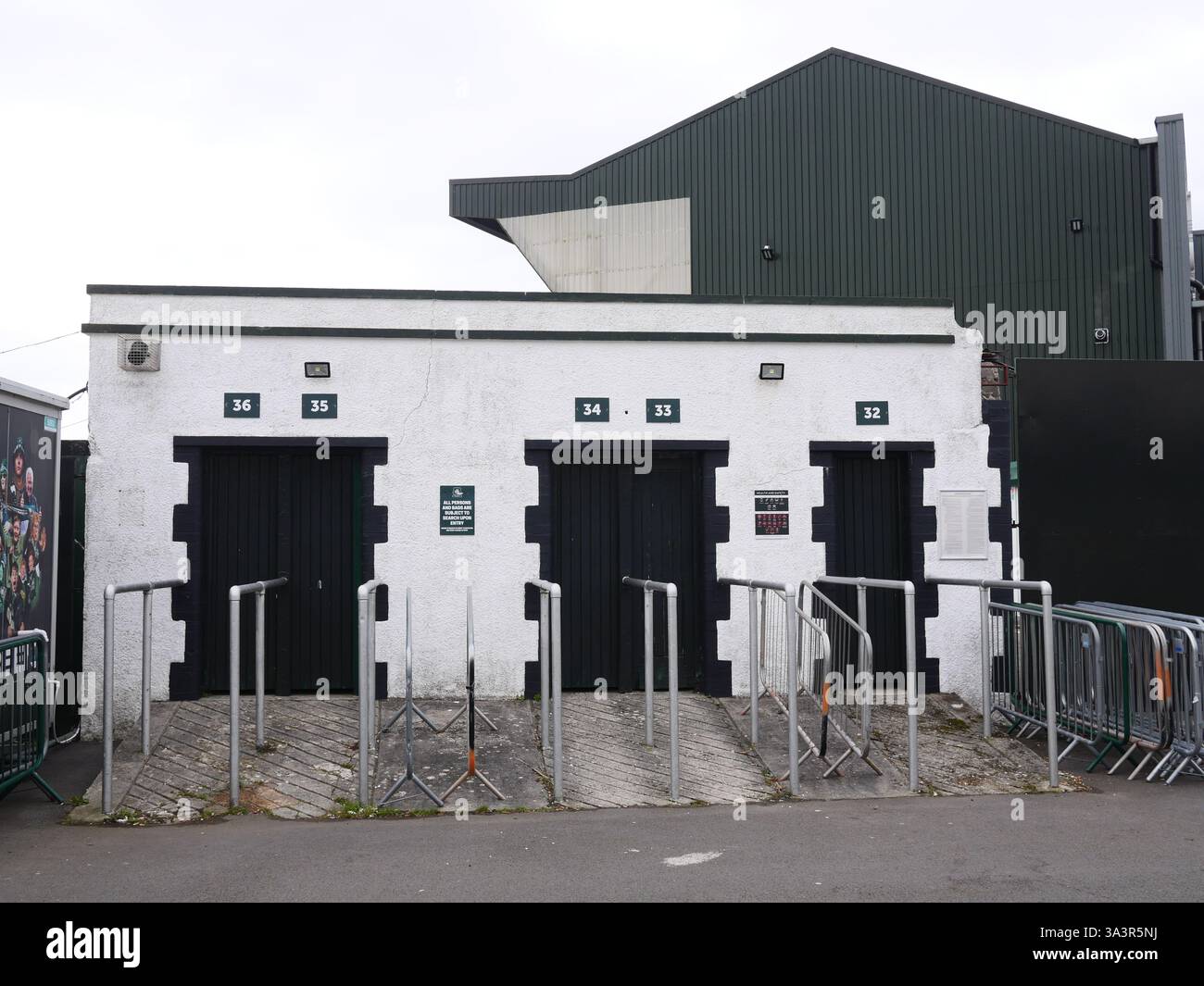 Football stadium entrance for public fans with barriers to create queue ...