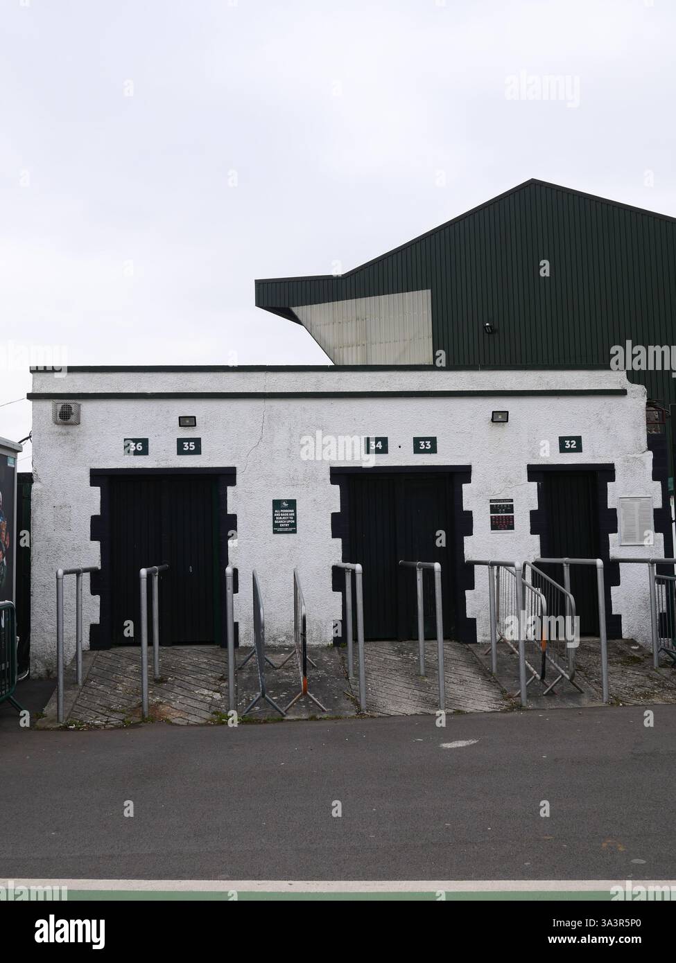 Football stadium entrance for public fans with barriers to create queue ...